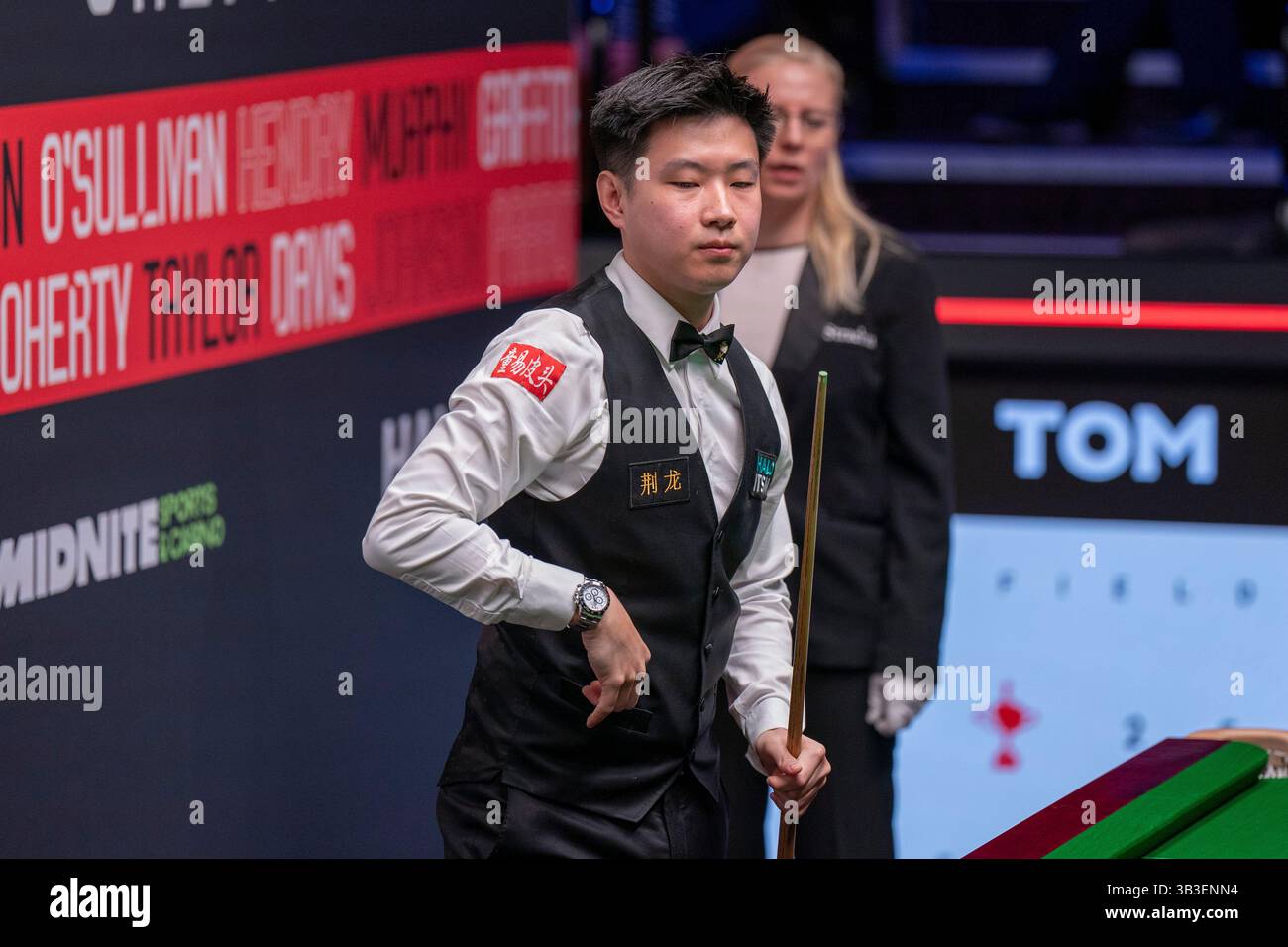 Zhou Xintong during the 2025 Halo World Snooker Championship at The Crucible Theatre, Sheffield ...