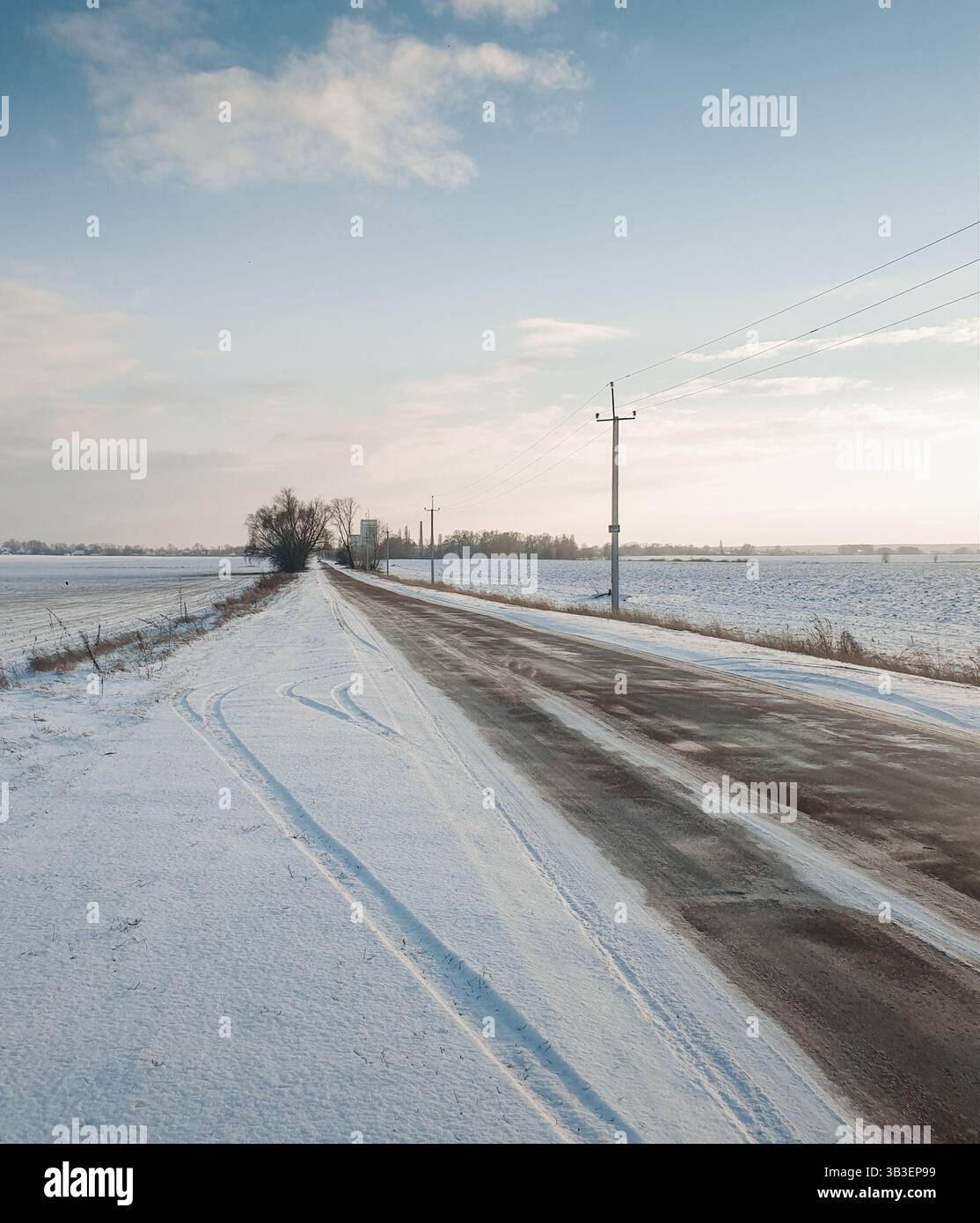 Winter countryside road in hi-res stock photography and images - Alamy