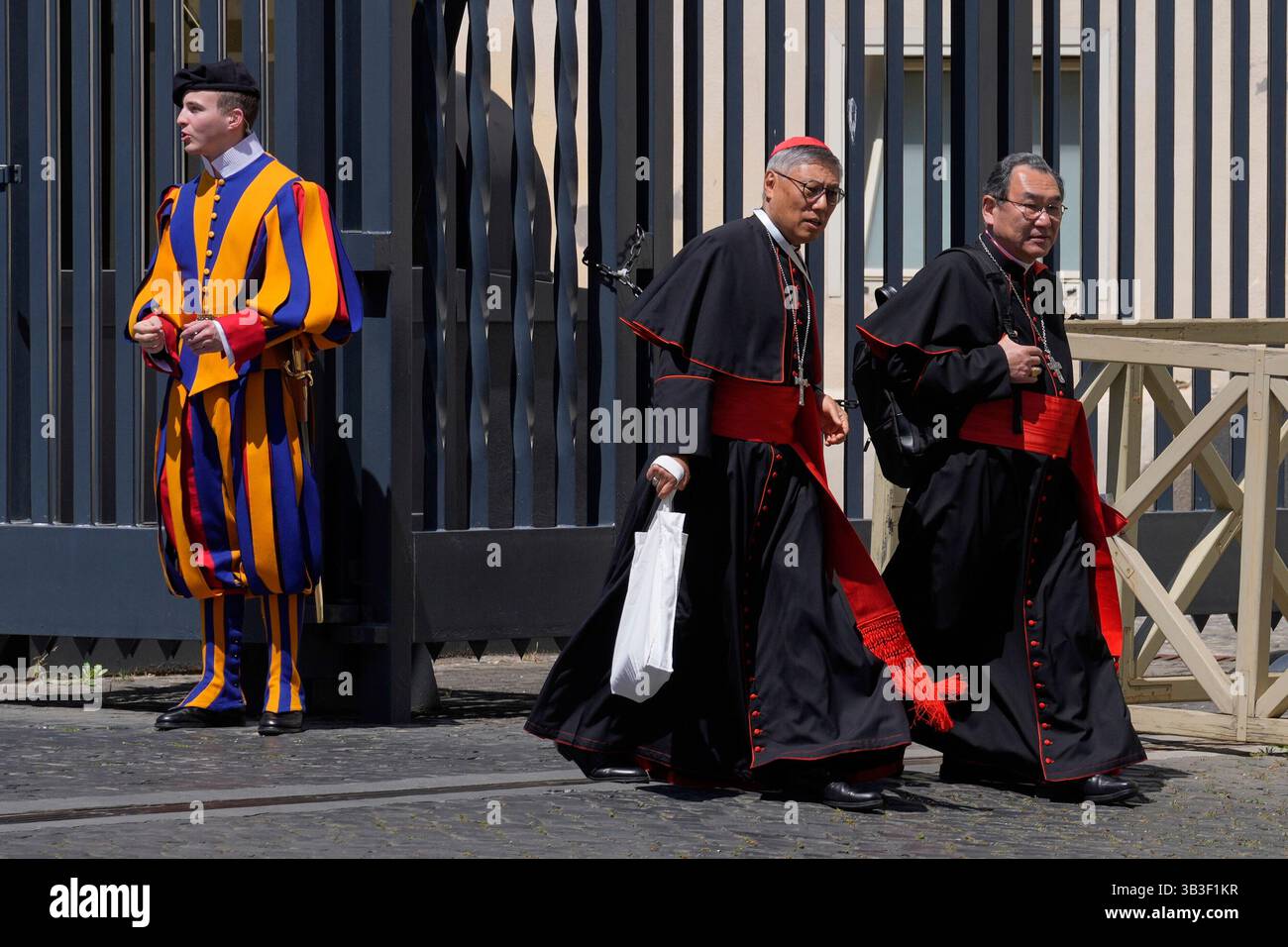 Cardinals Tarcisio Isao Kikuchi, right, and Stephen Chow Sau-yan leave ...