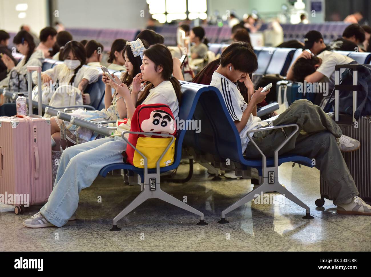 FUYANG, CHINA - APRIL 29, 2025 - Passengers are waiting in the waiting ...