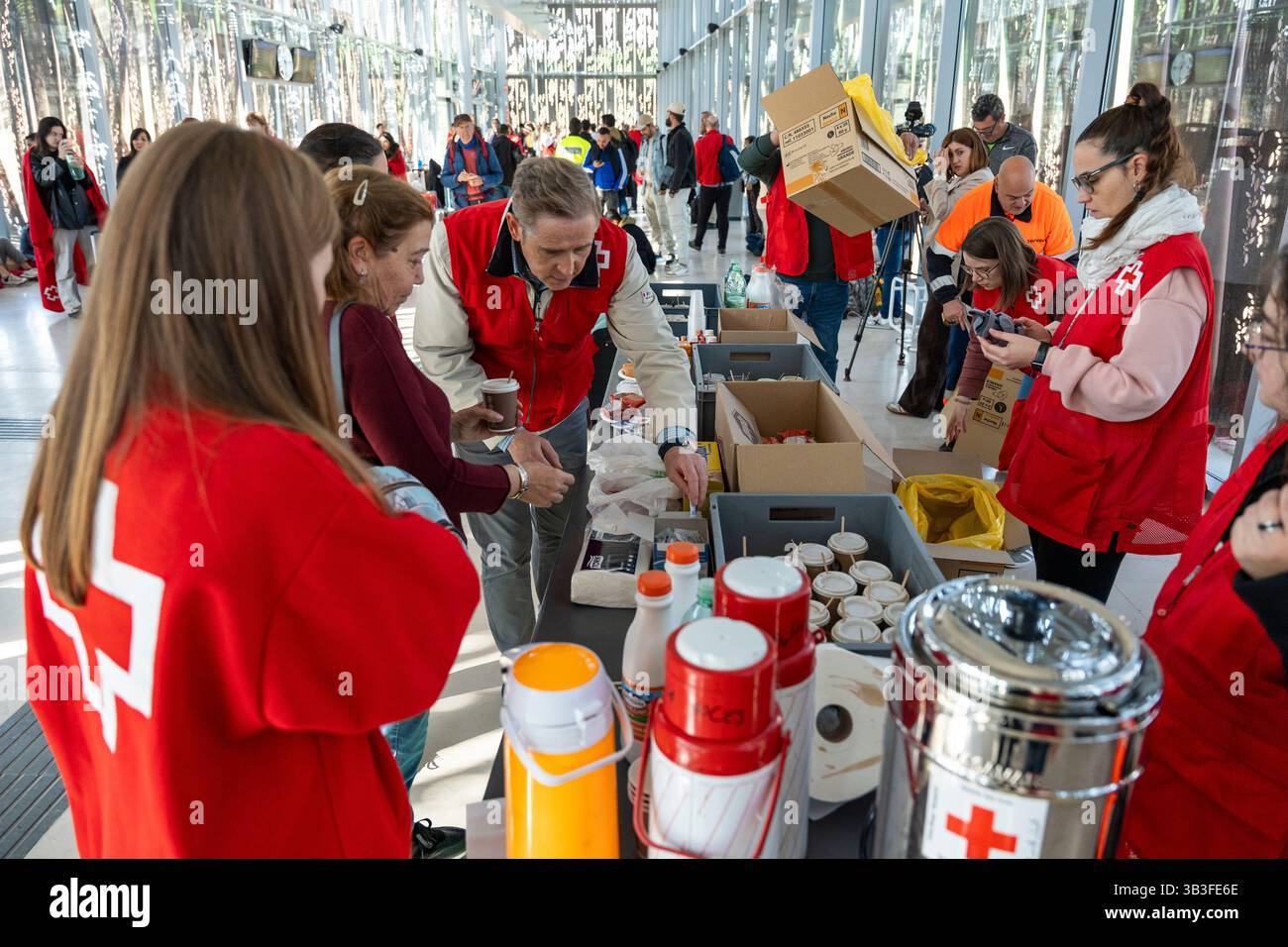 Several people are assisted by the Red Cross during the blackout, at ...