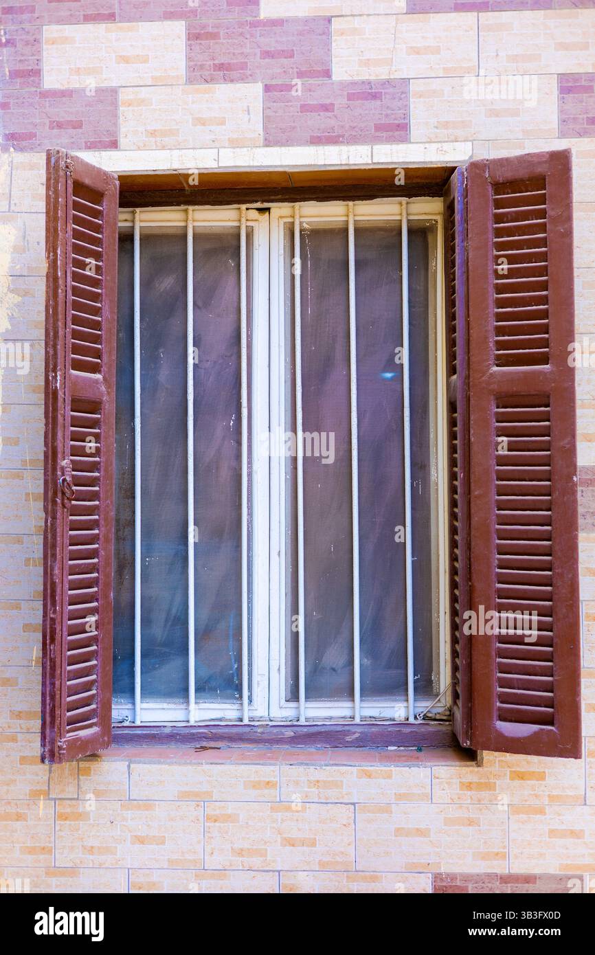 Old Window with Open Wooden Shutters and Metal Security Bars in Egypt ...