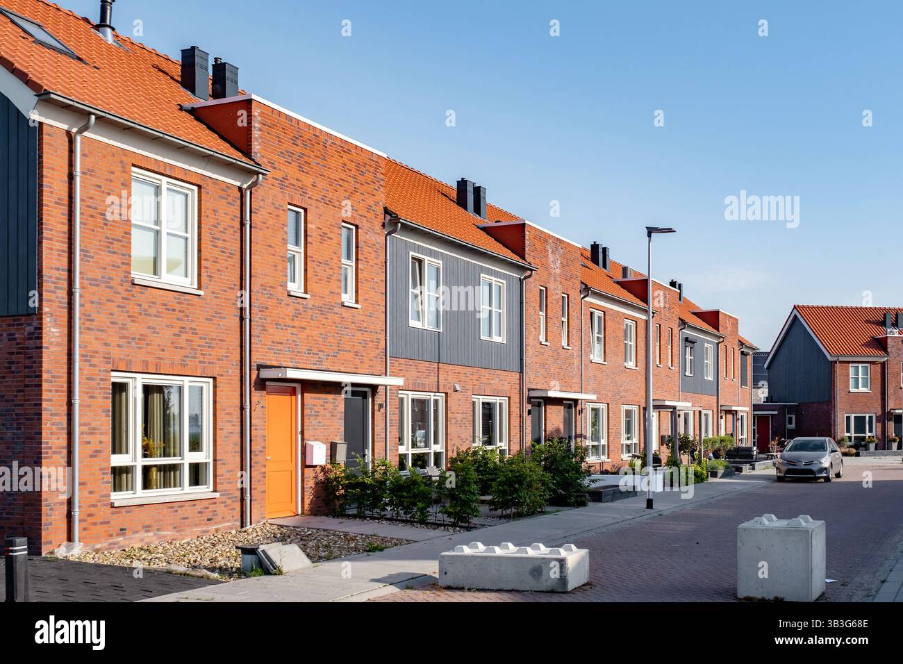 Discover a beautiful Dutch suburban area showcasing modern family ...