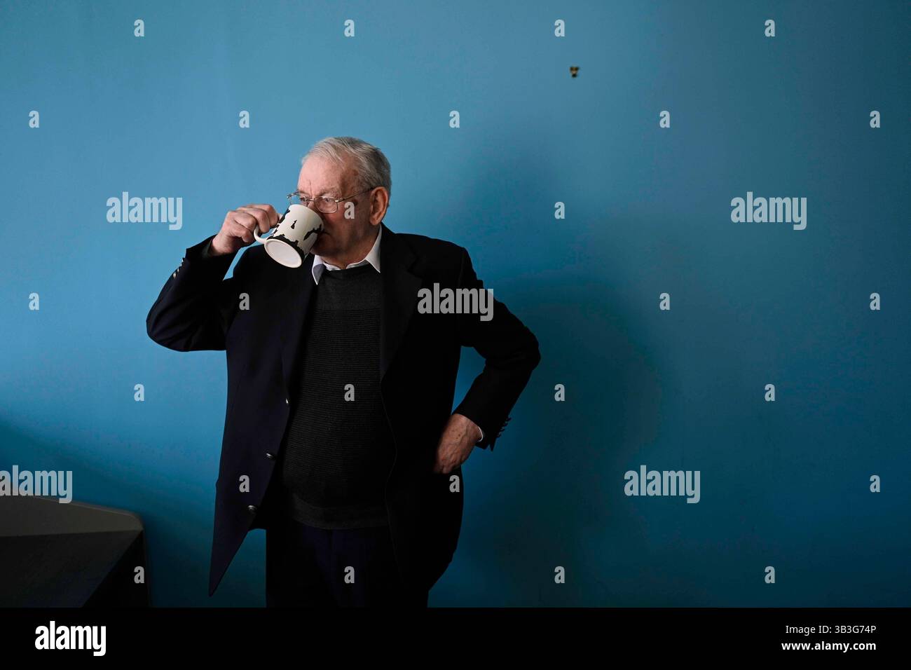 Kingsmill Massacre survivor Alan Black sips a drink after a press ...