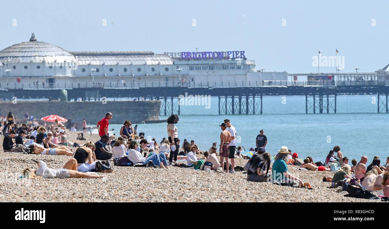 Brighton UK 29th April 2025 - Visitors enjoy the hot sunny weather on ...