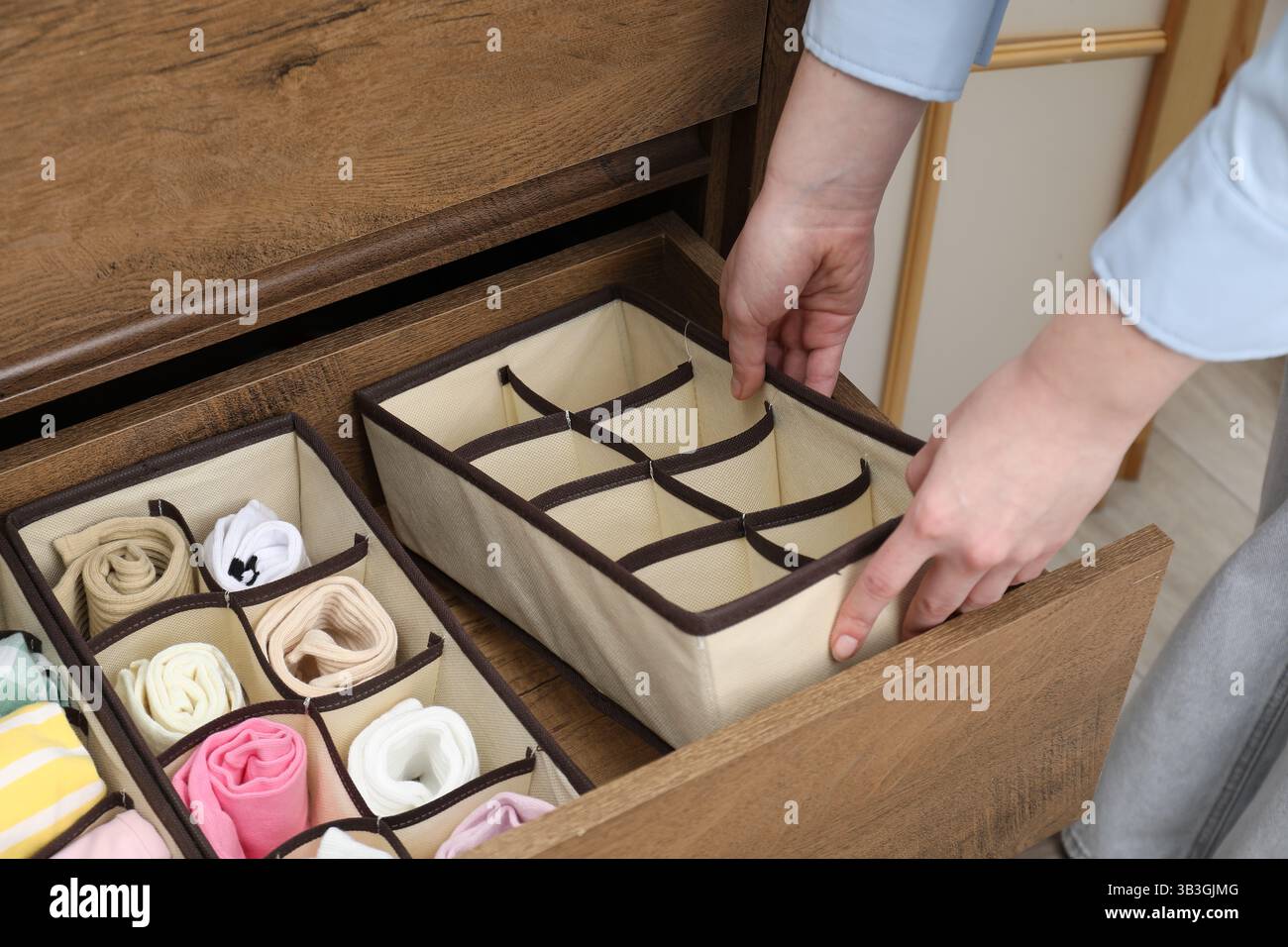 Woman putting empty organizer hi-res stock photography and images - Alamy