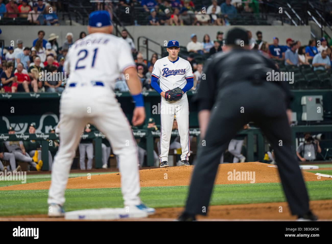 Texas Rangers pitcher Patrick Corbin looks to first base during the ...