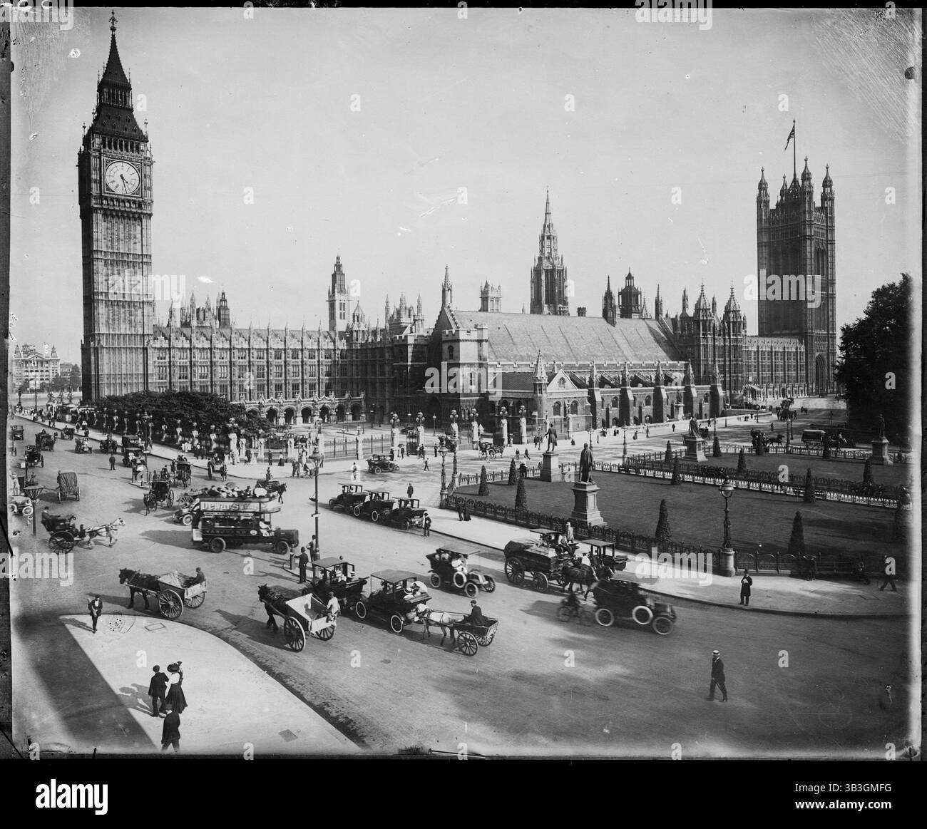 Traffic passing the Palace of Westminster on Parliament Street and Parliament Square, as seen ...