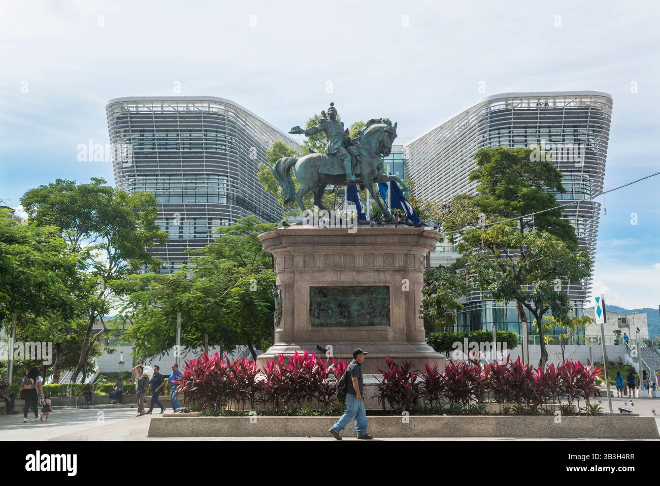 The new National Library behind the old bronze statue of president ...