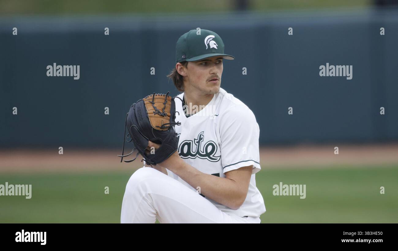 Michigan State's Logan Pikur pitches during an NCAA baseball game on ...