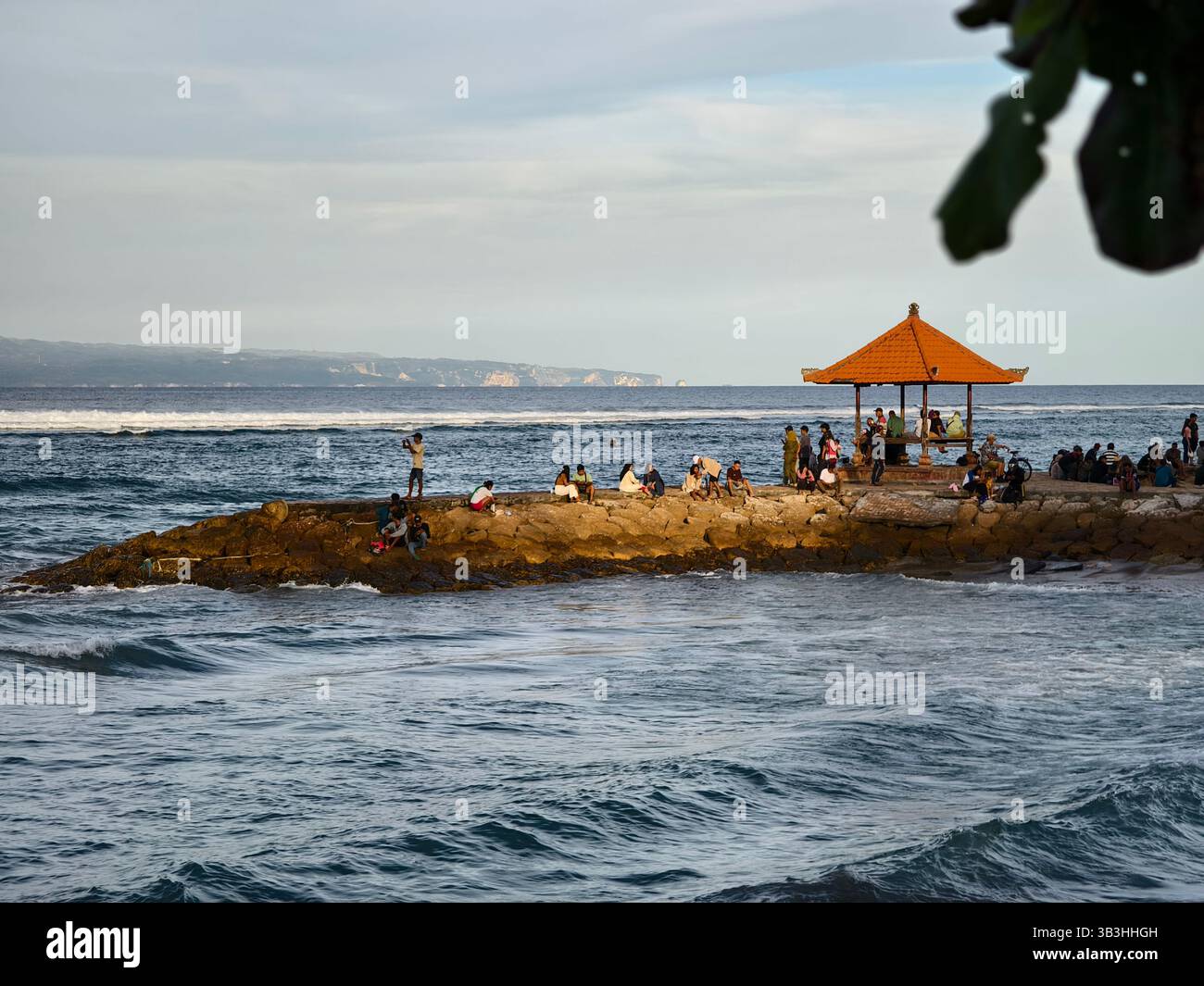 Sanur, Bali, Indonesia – April 23, 2025: A group of people gathers at ...