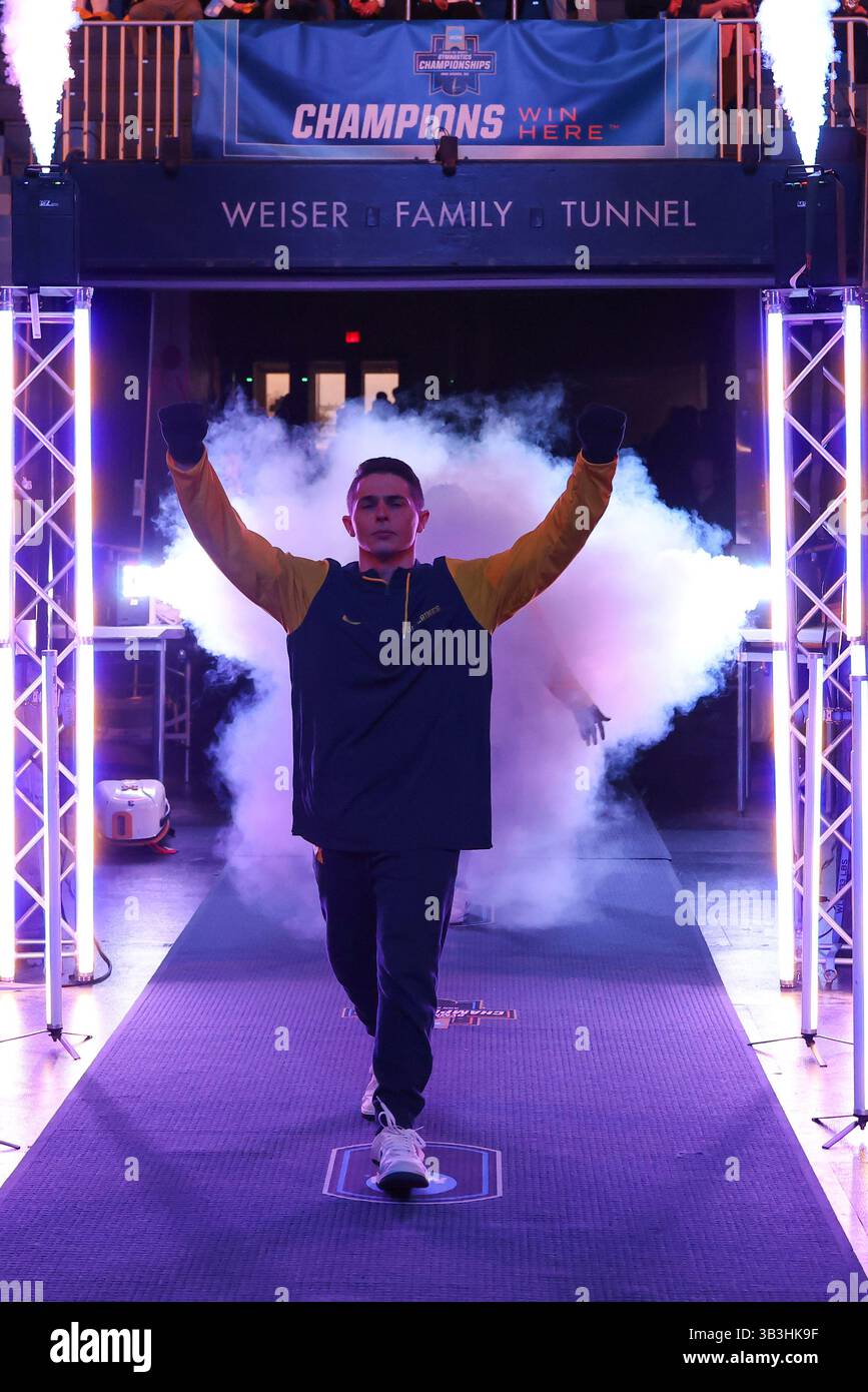 ANN ARBOR, MI - APRIL 19: Michigan gymnast Paul Juda gestures to fans ...