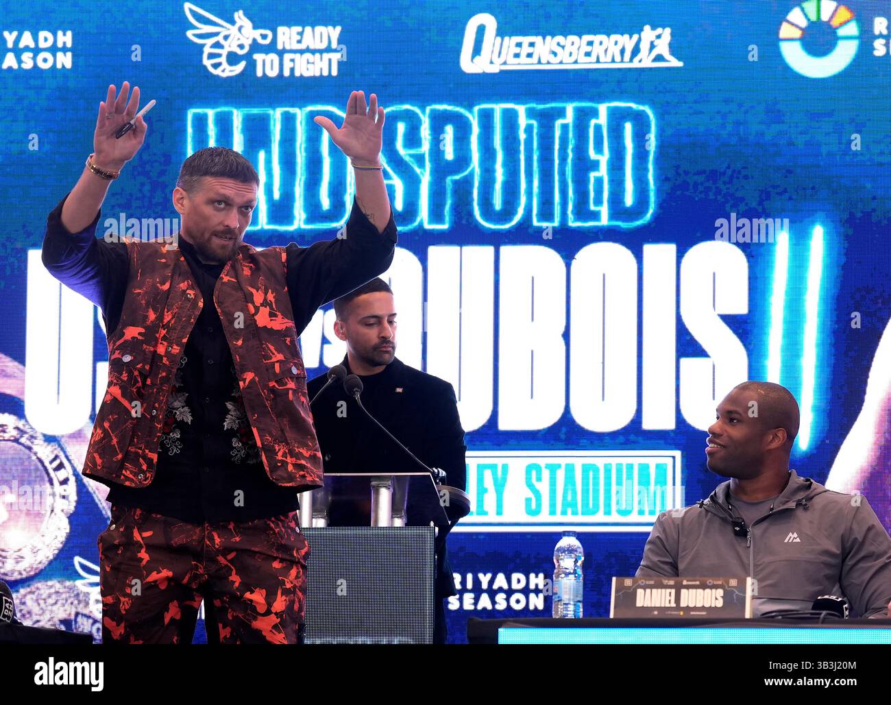 Oleksandr Usyk (left) and Daniel Dubois during a press conference at ...