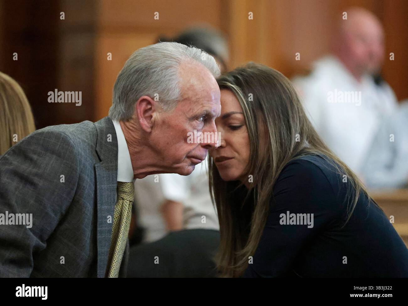 After the day's last witness, Karen Read confers with her father ...