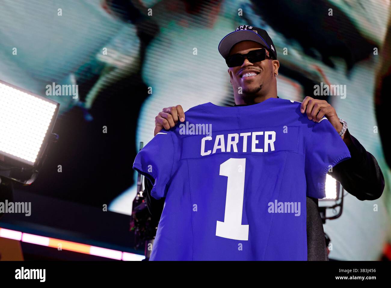 Penn State defensive end Abdul Carter poses after being chosen by the ...