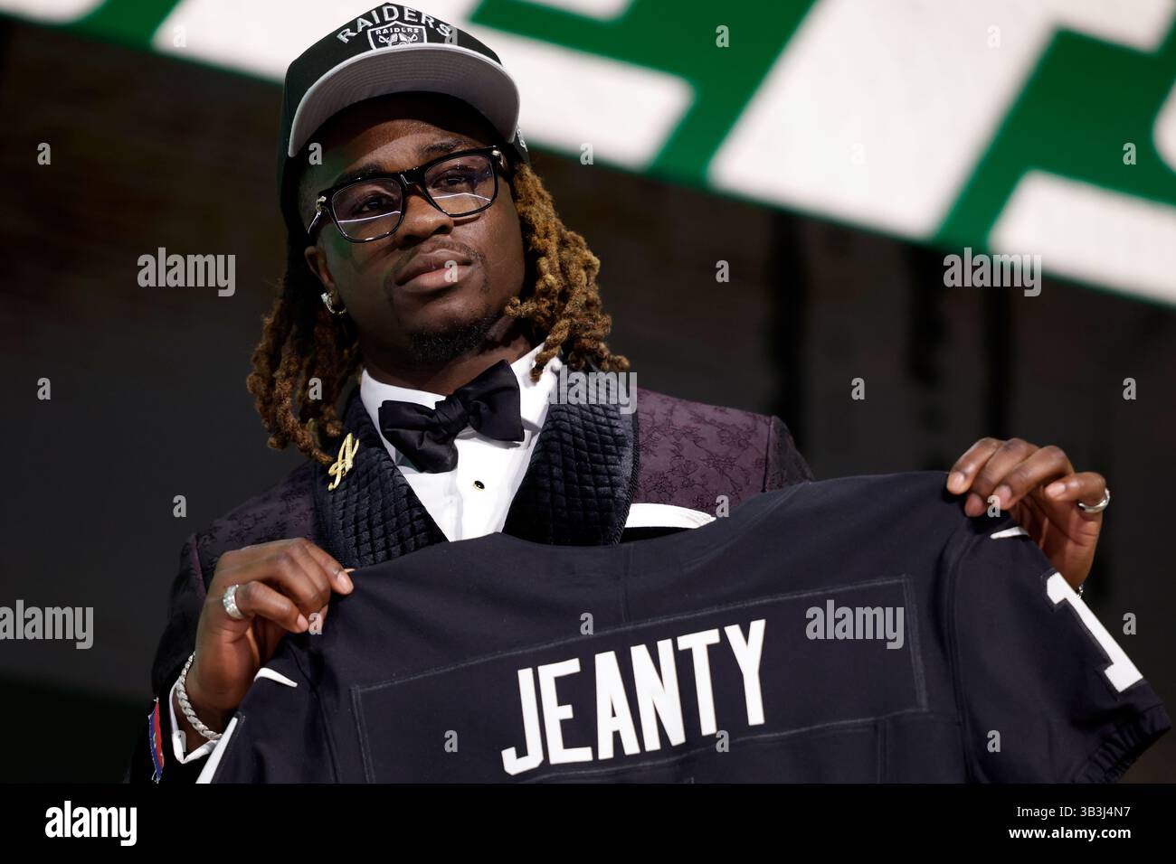 Boise State running back Ashton Jeanty reacts after being chosen by the Las Vegas Raiders with ...