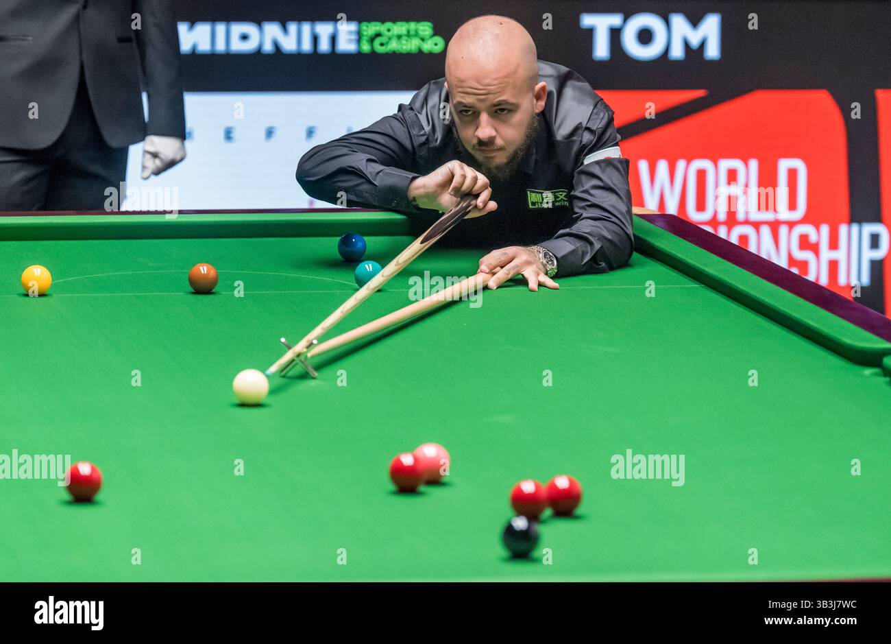 Luca Brecel during of his match against Judd Trump, on day eleven of ...
