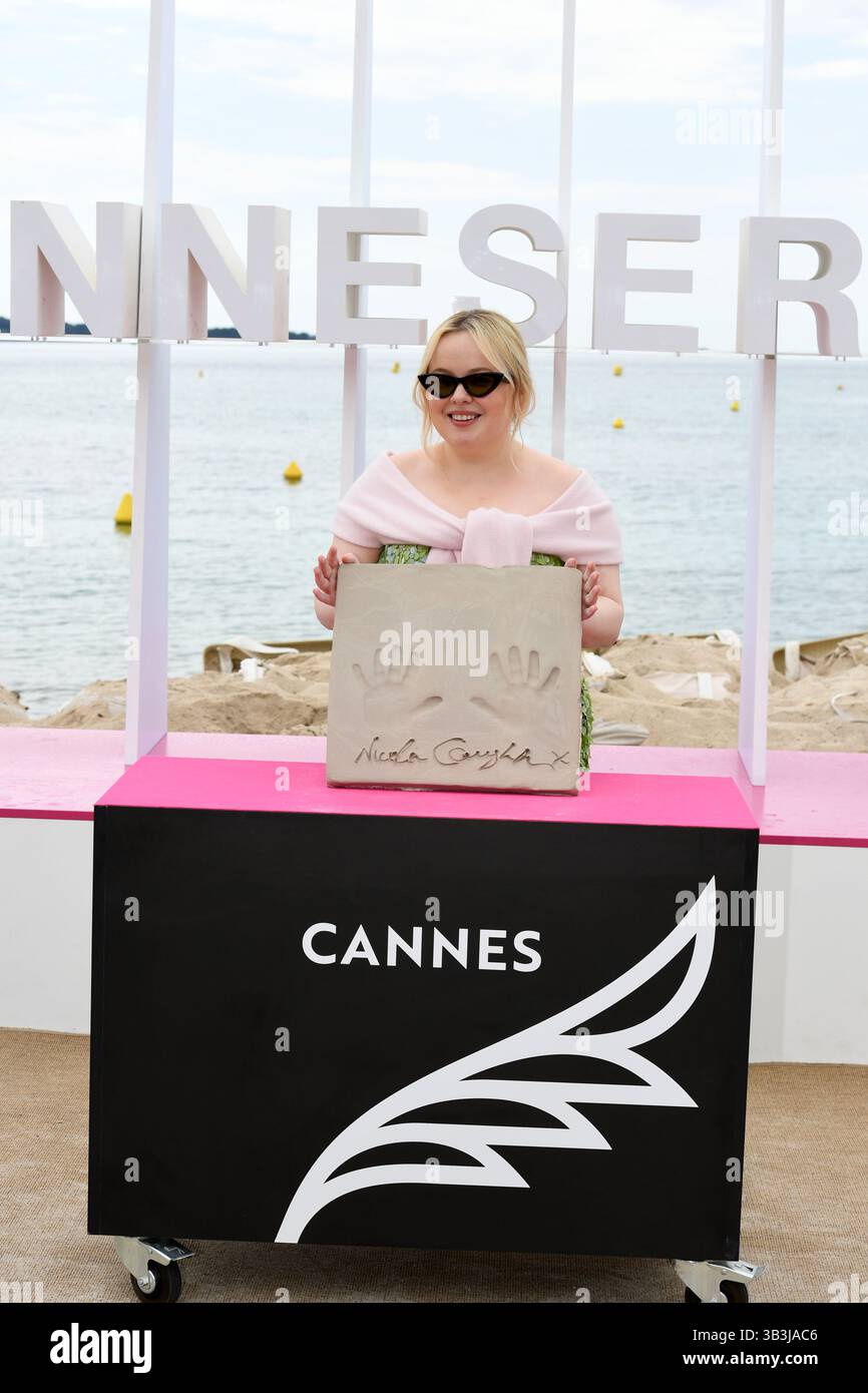 Nicola Coughlan shows off her handprints in cement during the "Prix ...