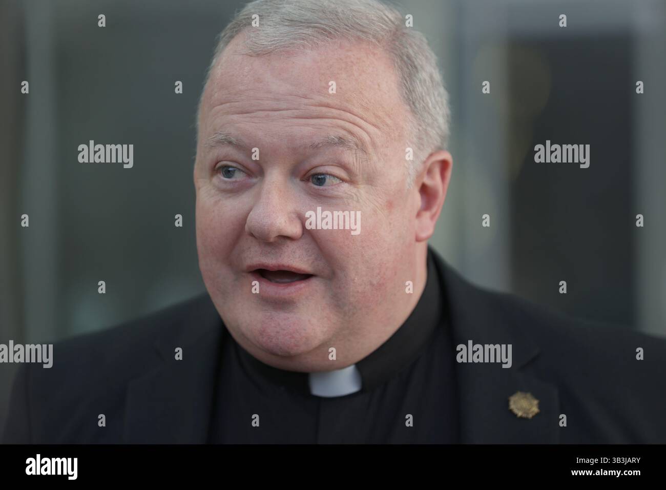 Father Paul Murphy speaks to media after leaving the Central Criminal ...