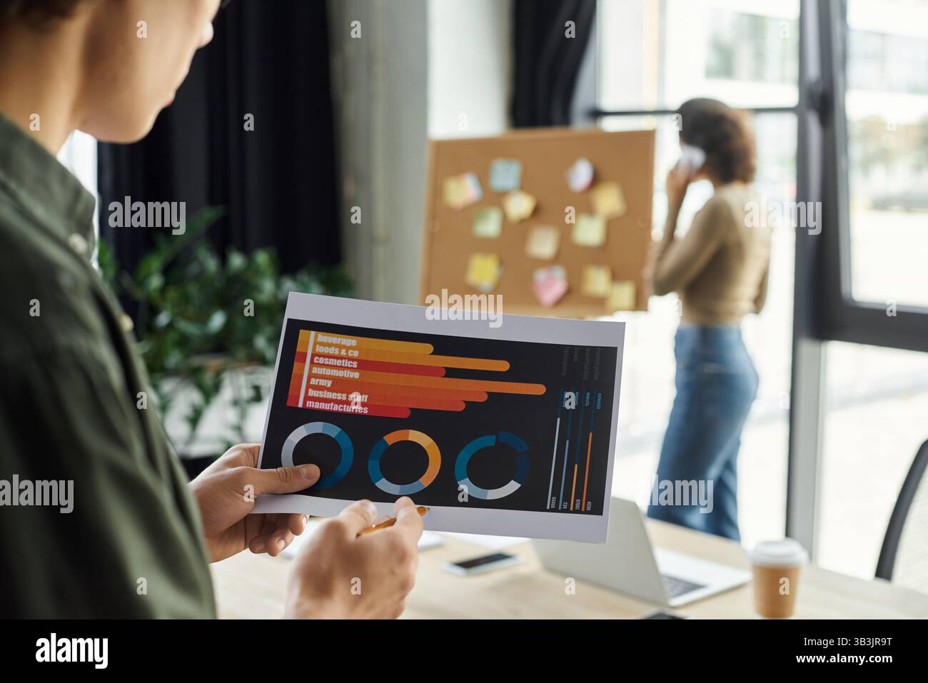 Person analyzes data charts hi-res stock photography and images - Alamy