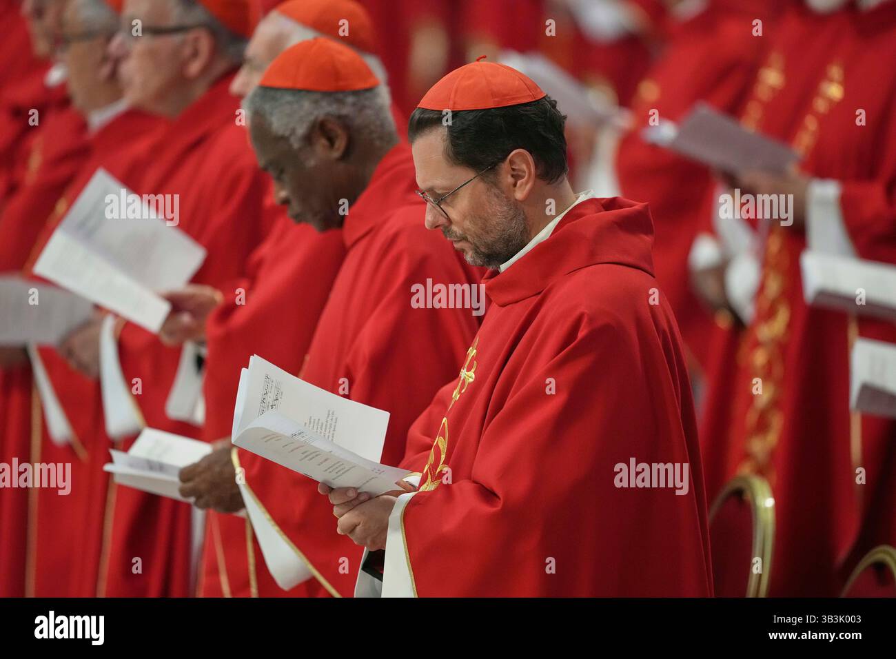 Cardinal Giorgio Marengo, foreground, and Cardinal Peter Turkson attend ...