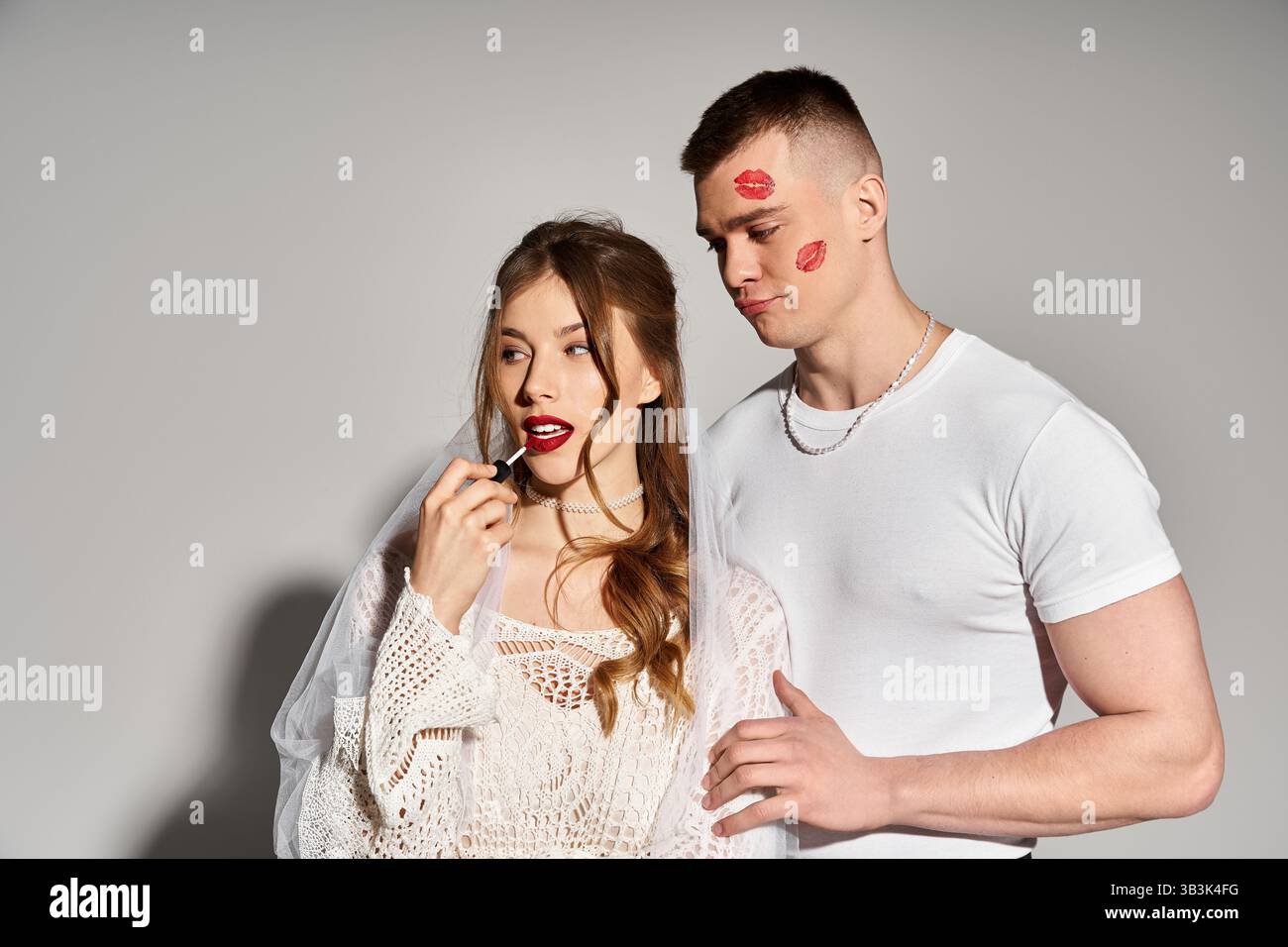 Couple shares a tender moment, showcasing joy and elegance in a ...
