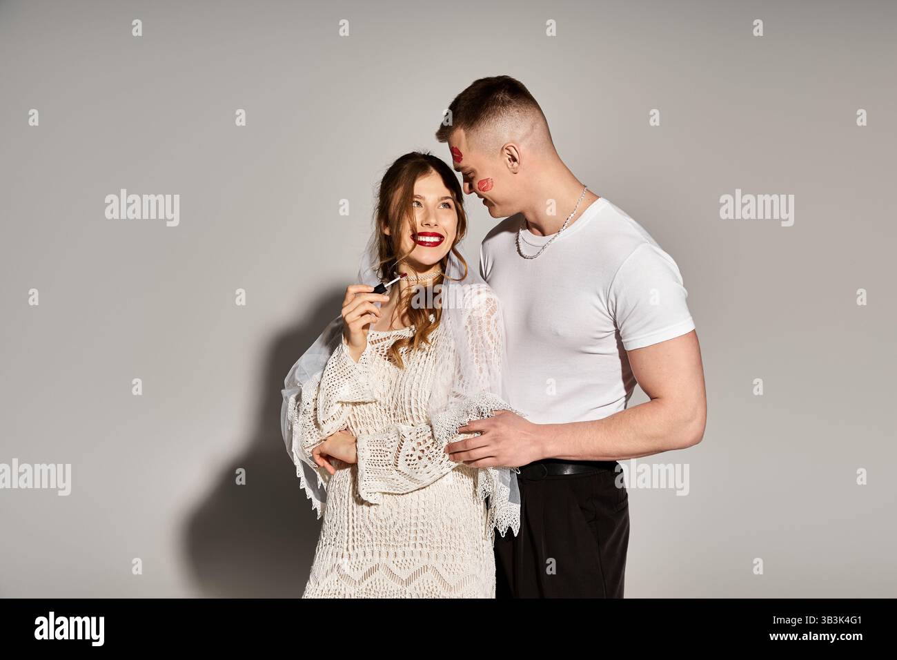 Beautiful young couple radiates joy while embracing love in a whimsical ...