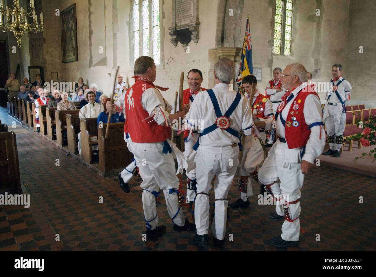 Folklore dance UK. East Kent Morris Men dancing inside the church of St ...
