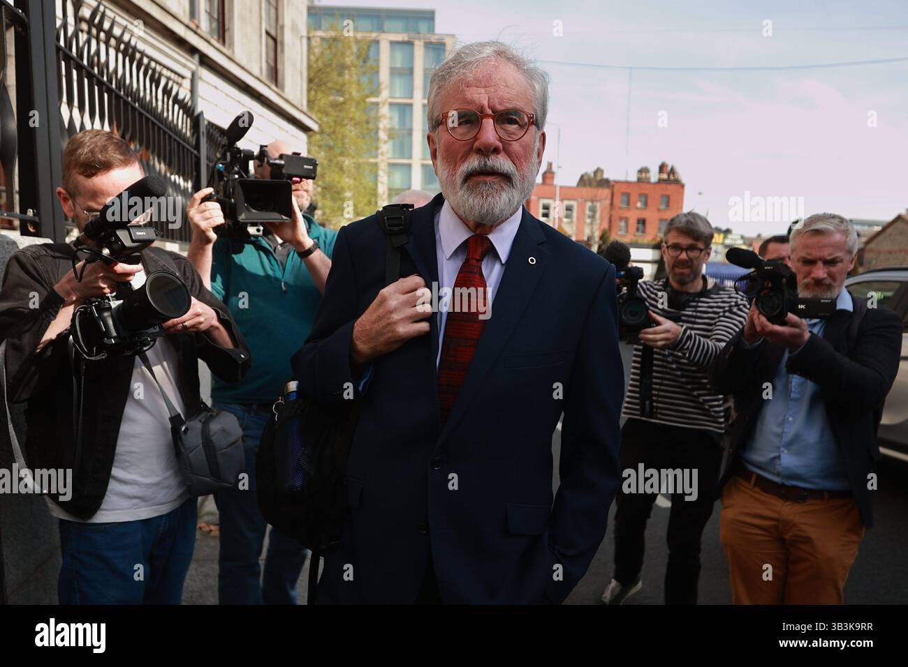 Former Sinn Fein president Gerry Adams arriving at the High Court in ...
