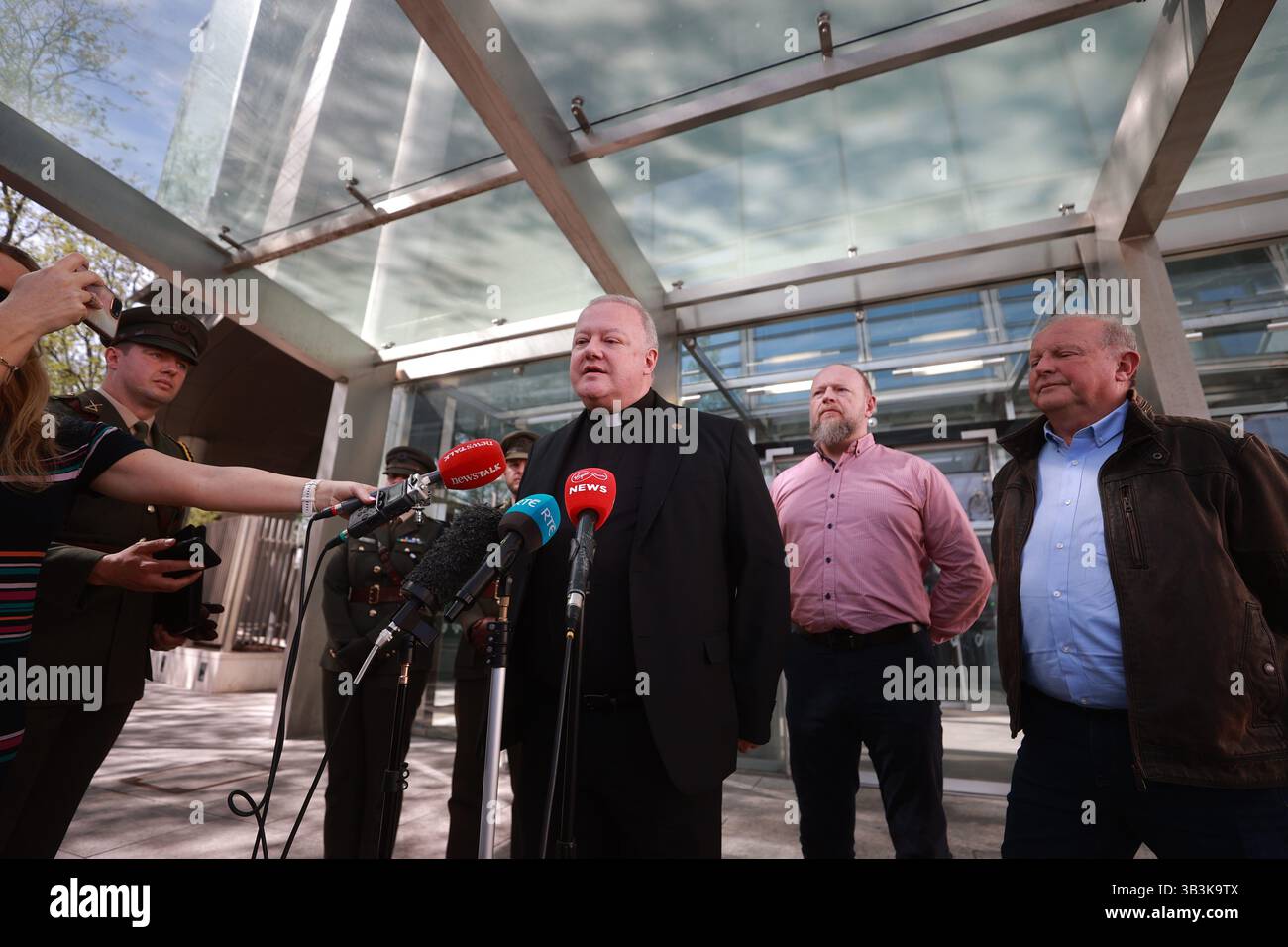 Father Paul Murphy speaks to media after leaving the Central Criminal ...