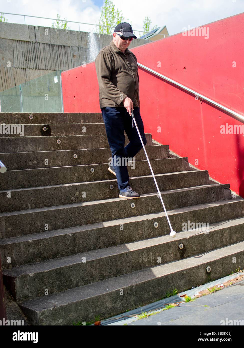 Guided white cane blind hi-res stock photography and images - Alamy