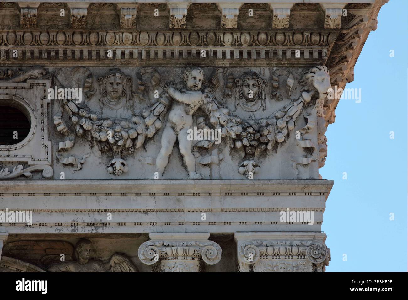 March 1, 2016 - Venice, Italy - Corner of the sculpted frieze of putti ...