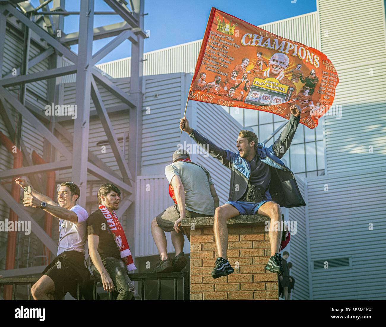 LIVERPOOL, ENGLAND - APRIL 27: Liverpool fan holds up a flag reading ...