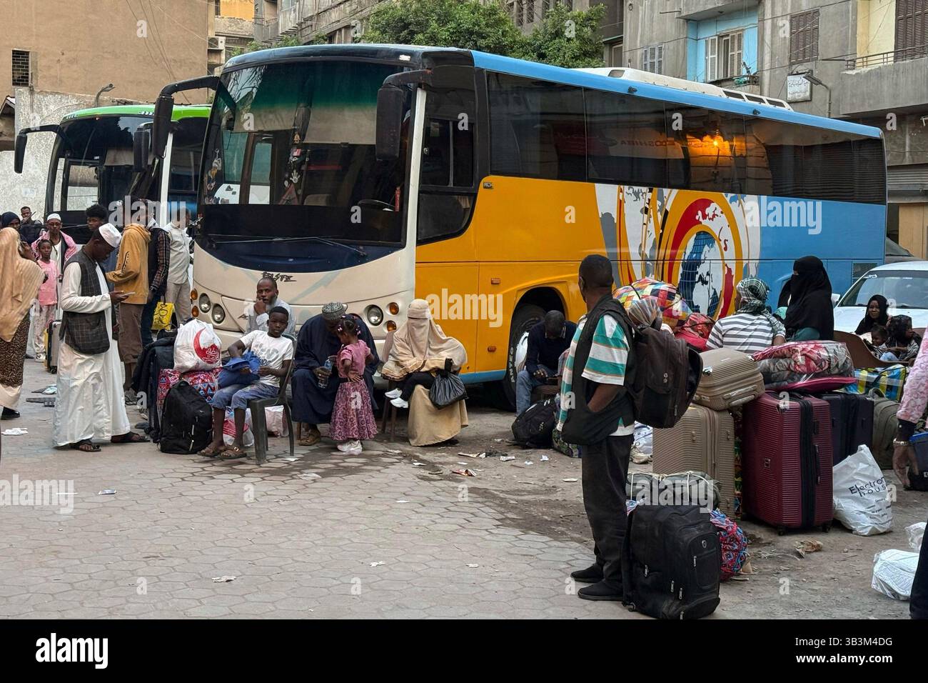 Sudanese people, who were driven from their homes and are now returning ...