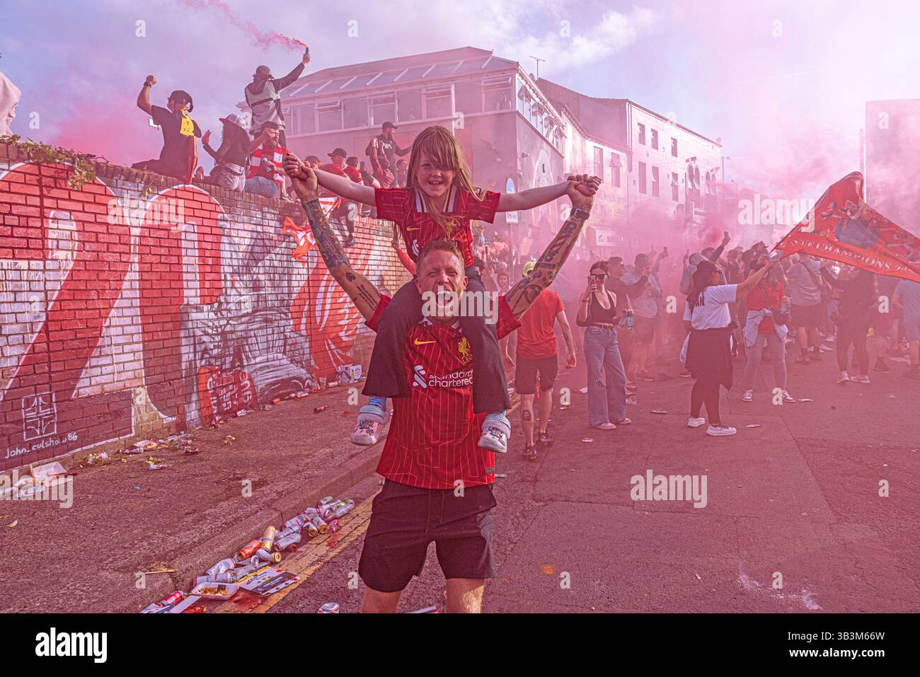 Liverpool supporters celebrating outside of Anfield stadium after their ...
