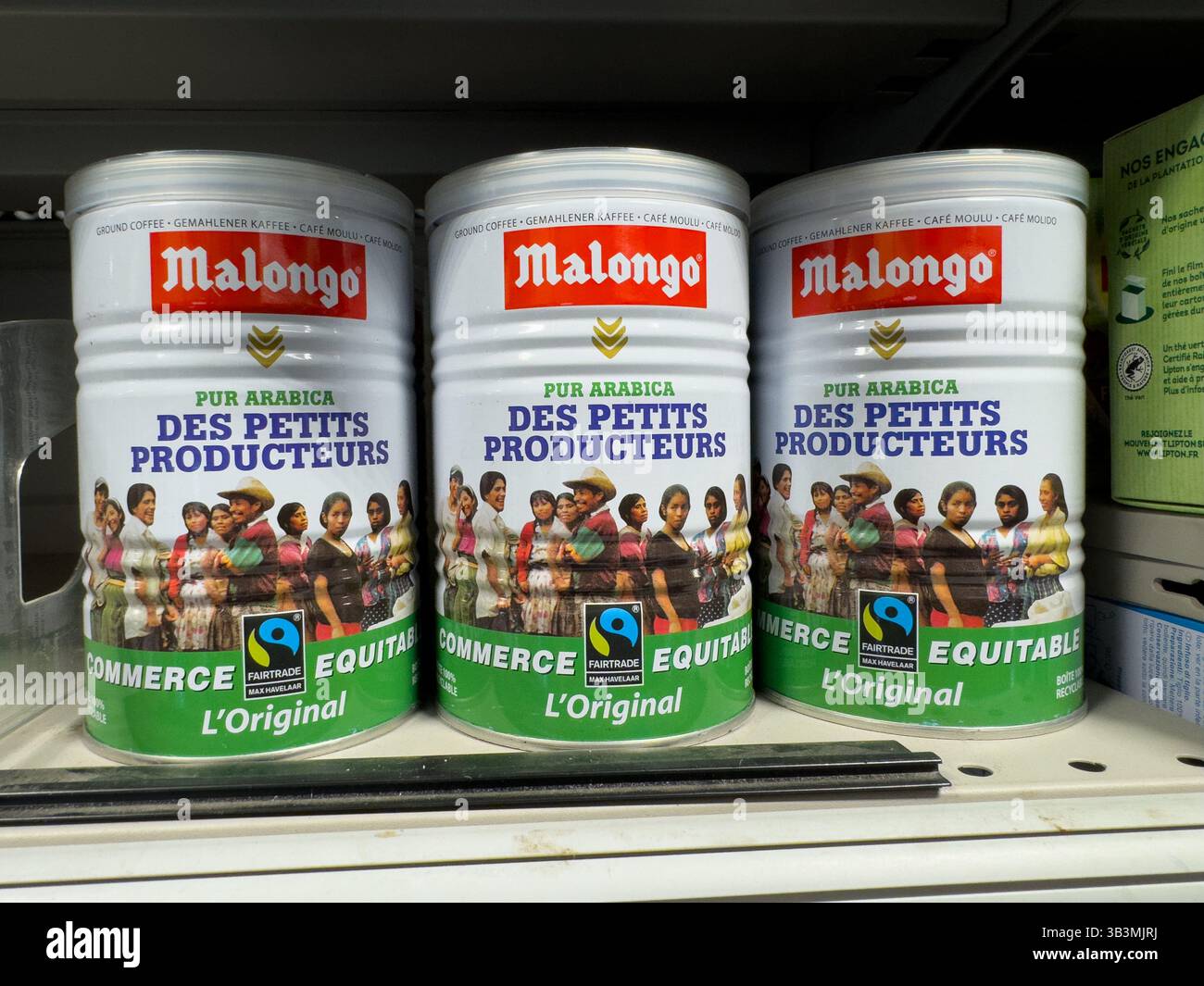 Fair trade coffee cans highlighting community and sustainability in a ...