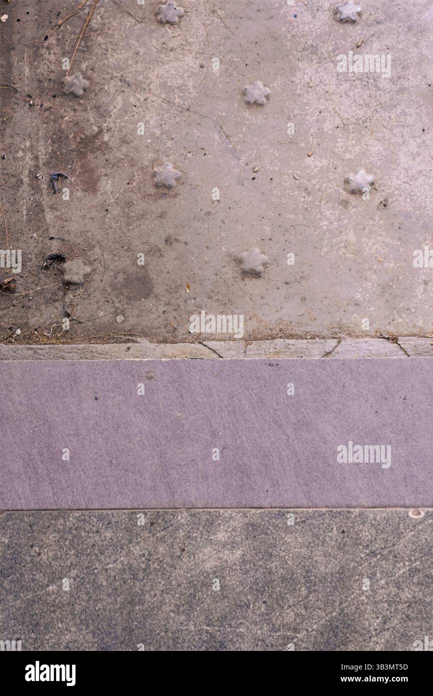 Worn concrete surface with decorative raised patterns Stock Photo - Alamy