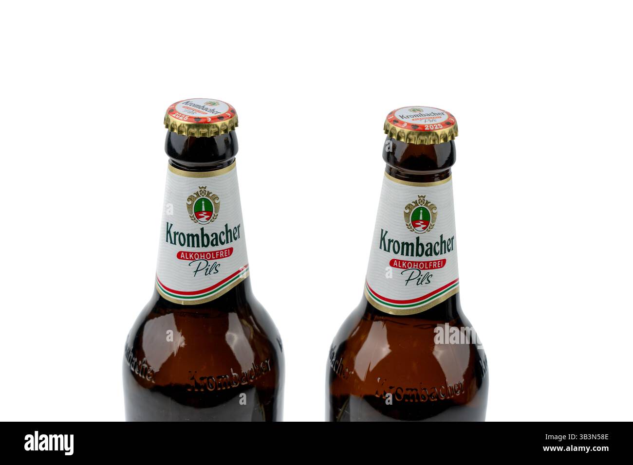 Germany Berlin April 29, 2025. Two bottles of Krombach beer. One is on ...