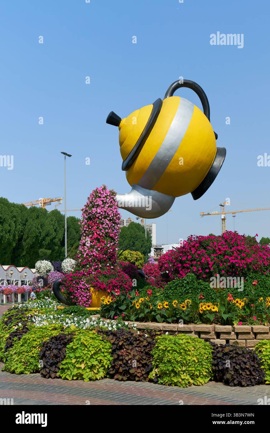 Dubai, UAE - February 2, 2023: A giant soaring yellow teapot and cup ...
