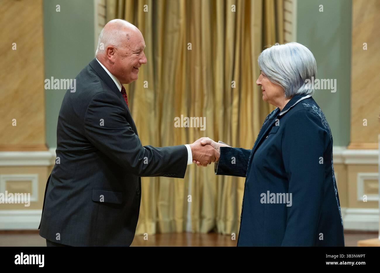 Governor General Mary Simon shakes hands with Peter Hoekstra, Ambassador-designate of the United ...
