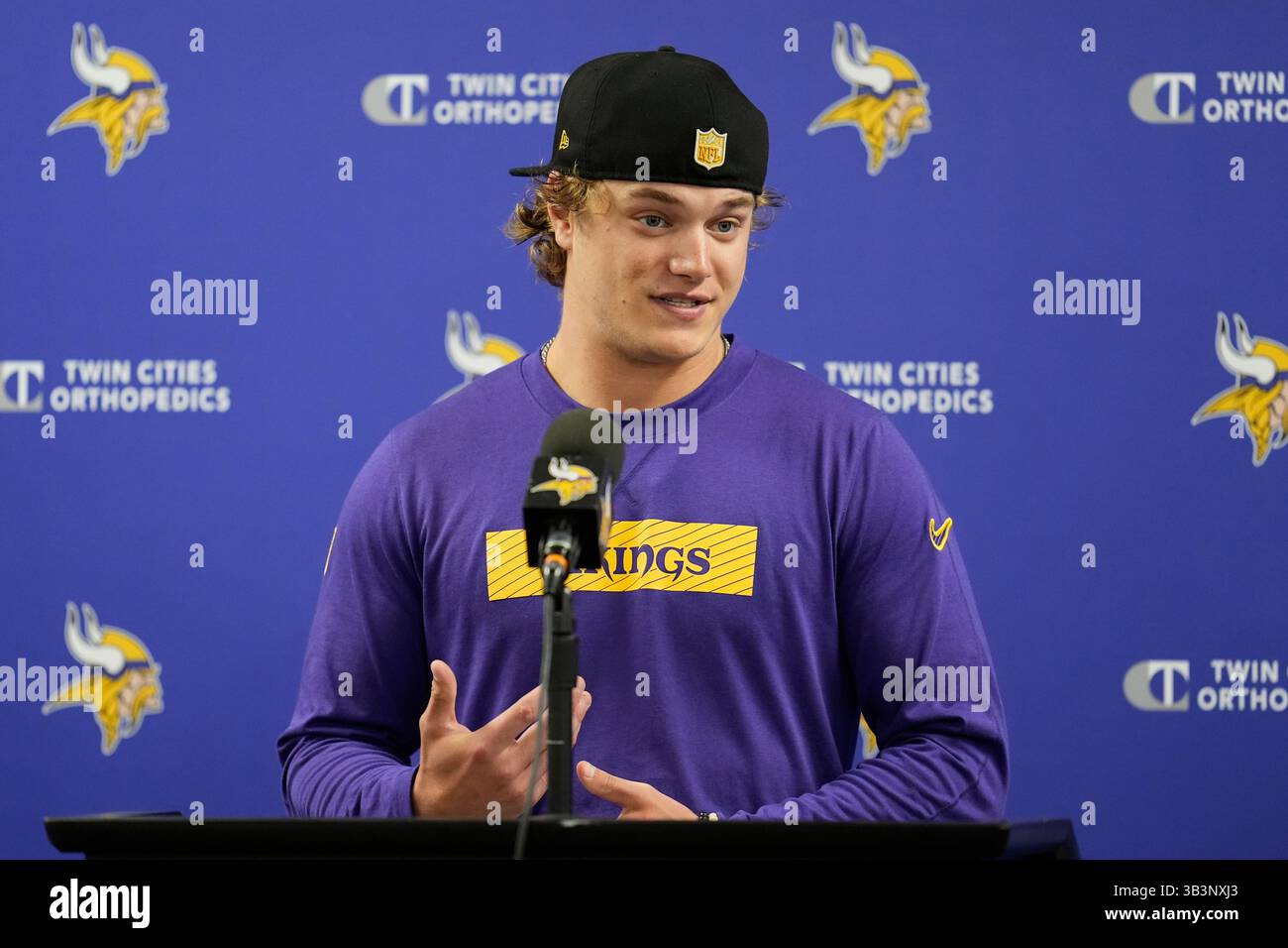 Minnesota Vikings quarterback J.J. McCarthy (9) answers questions during an NFL football press ...