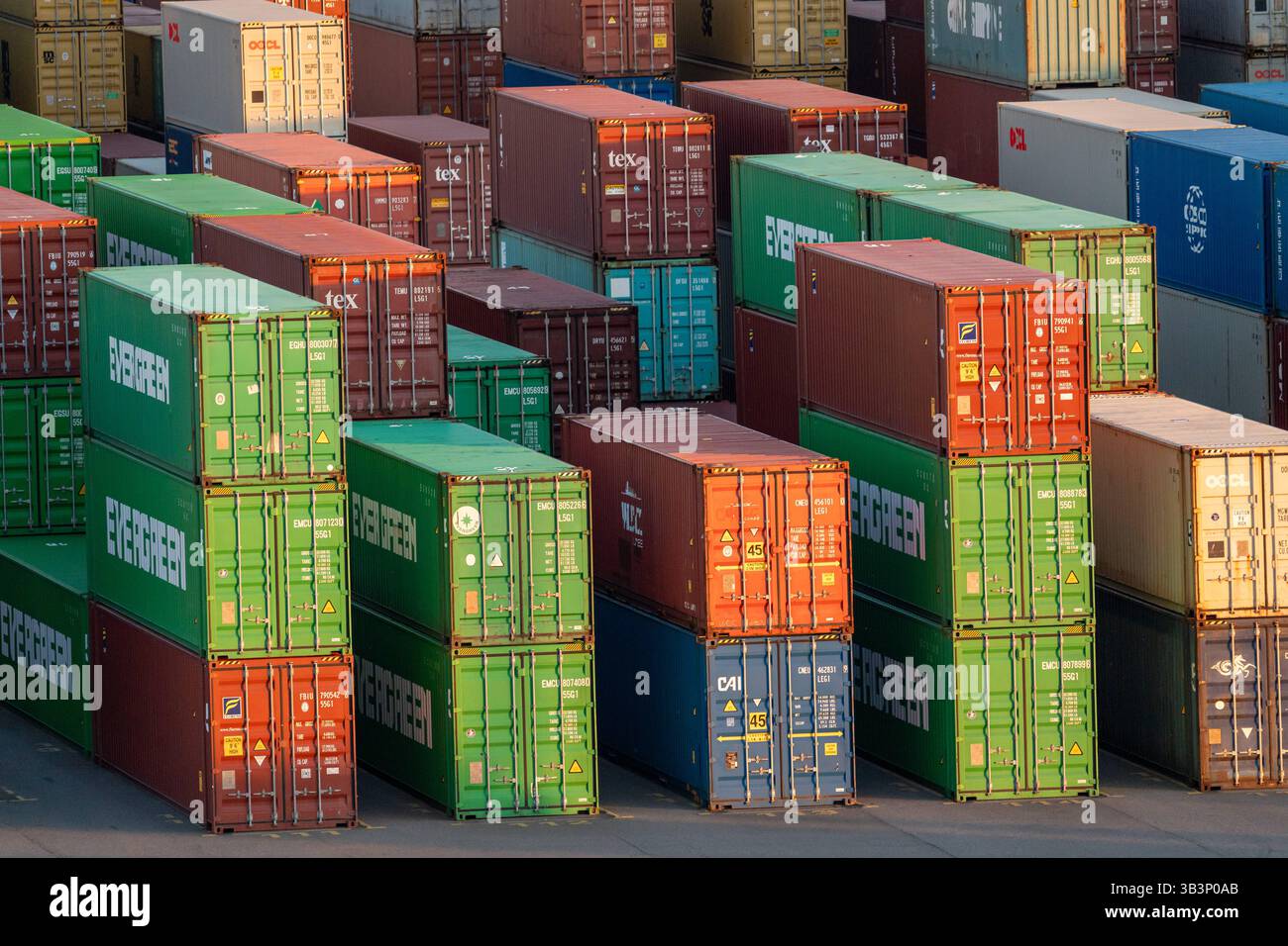 Hamburg, Germany - 27 April 2025: Stacked freight containers at a ...