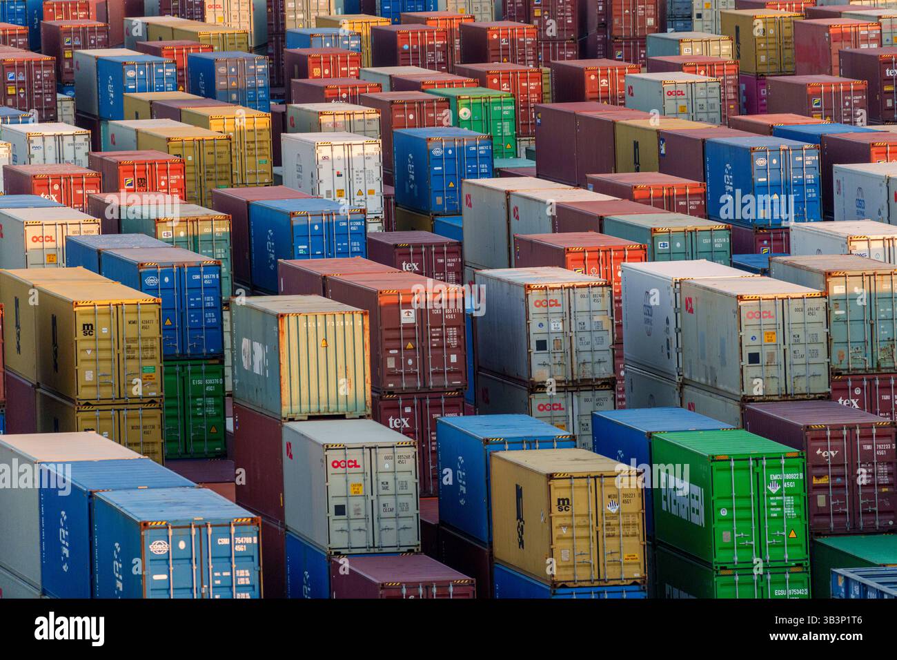 Hamburg, Germany - 27 April 2025: Stacked freight containers at a ...