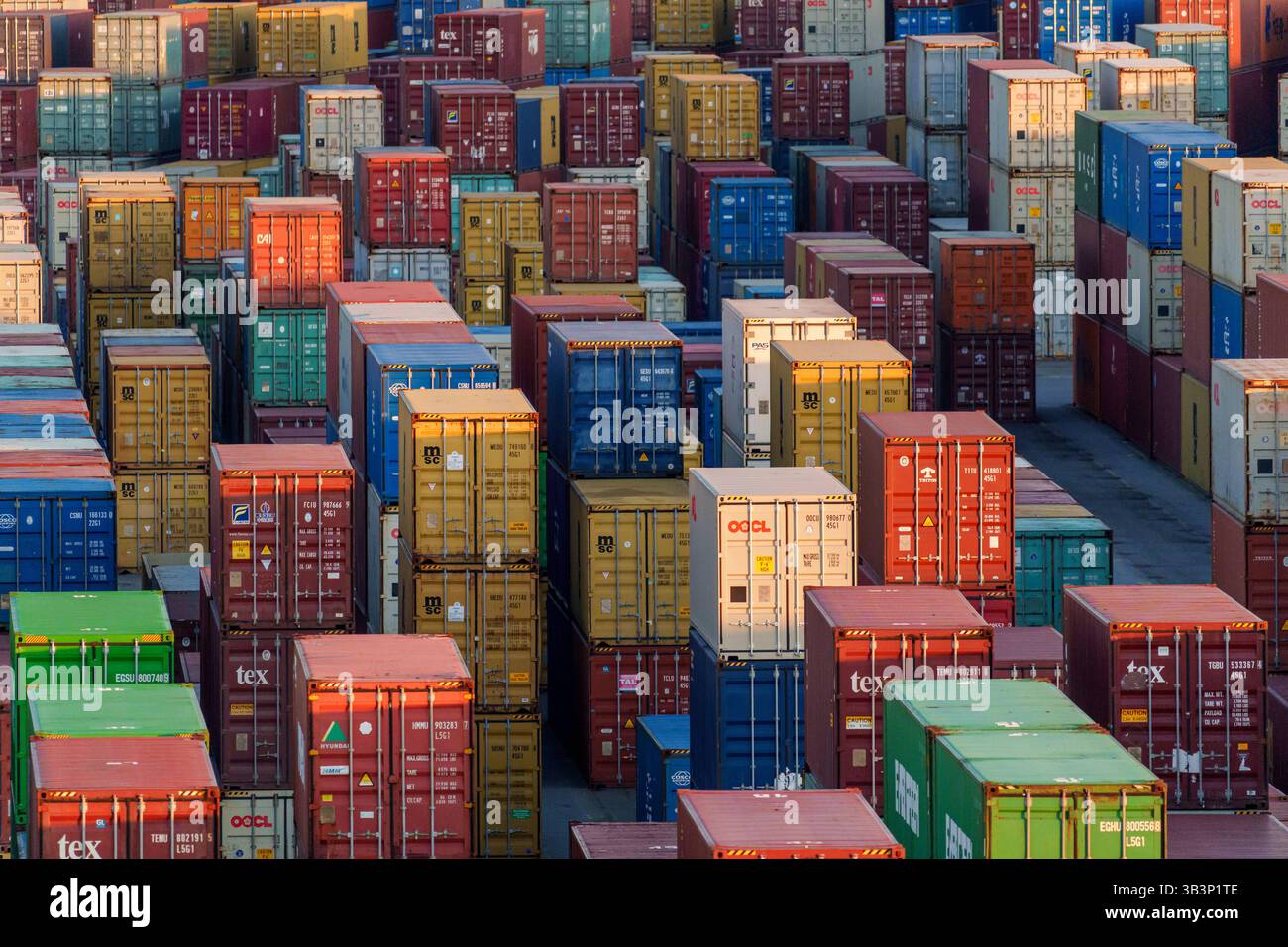 Hamburg, Germany - 27 April 2025: Stacked freight containers at a ...