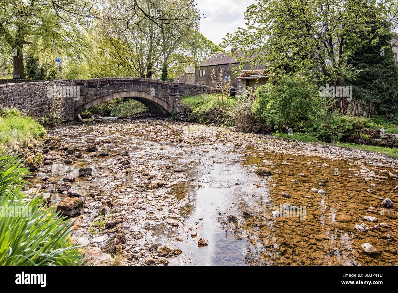 Characterful bridge over Clapham Beck, Clapham, North Yorkshire Stock ...
