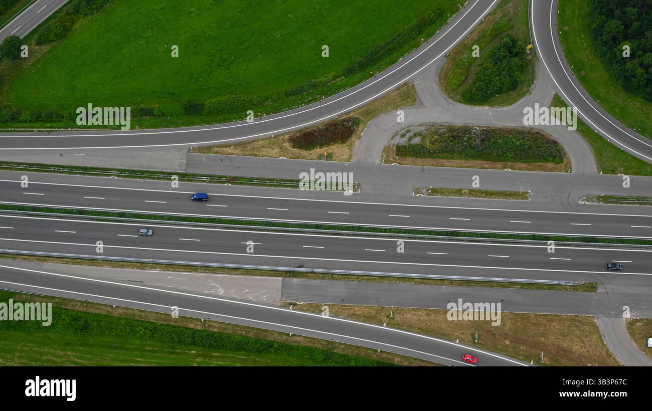 Terrain view from the drone on highway or country road with cars and ...