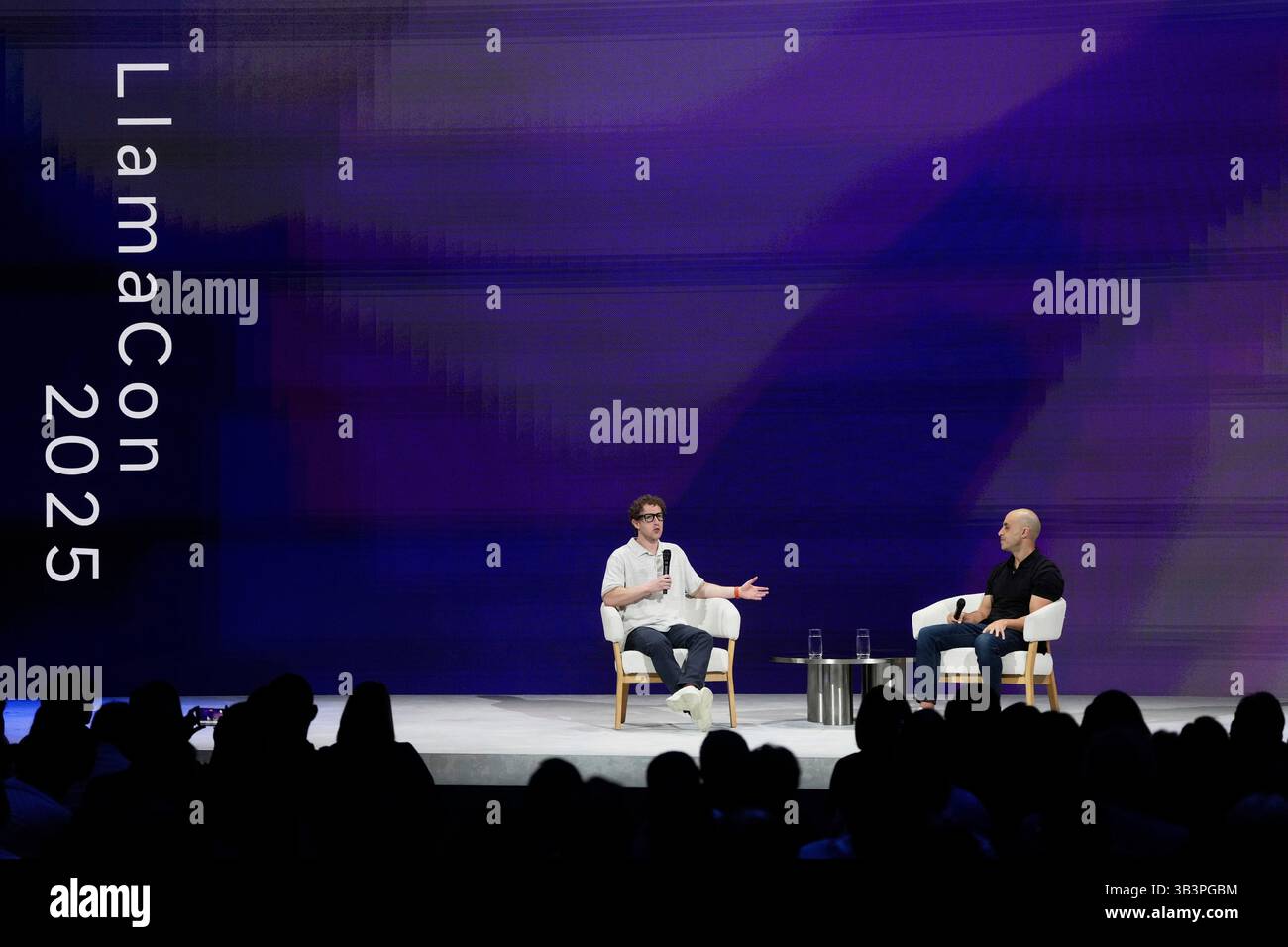 Meta Founder and CEO Mark Zuckerberg, left, speaks with Databricks Co ...