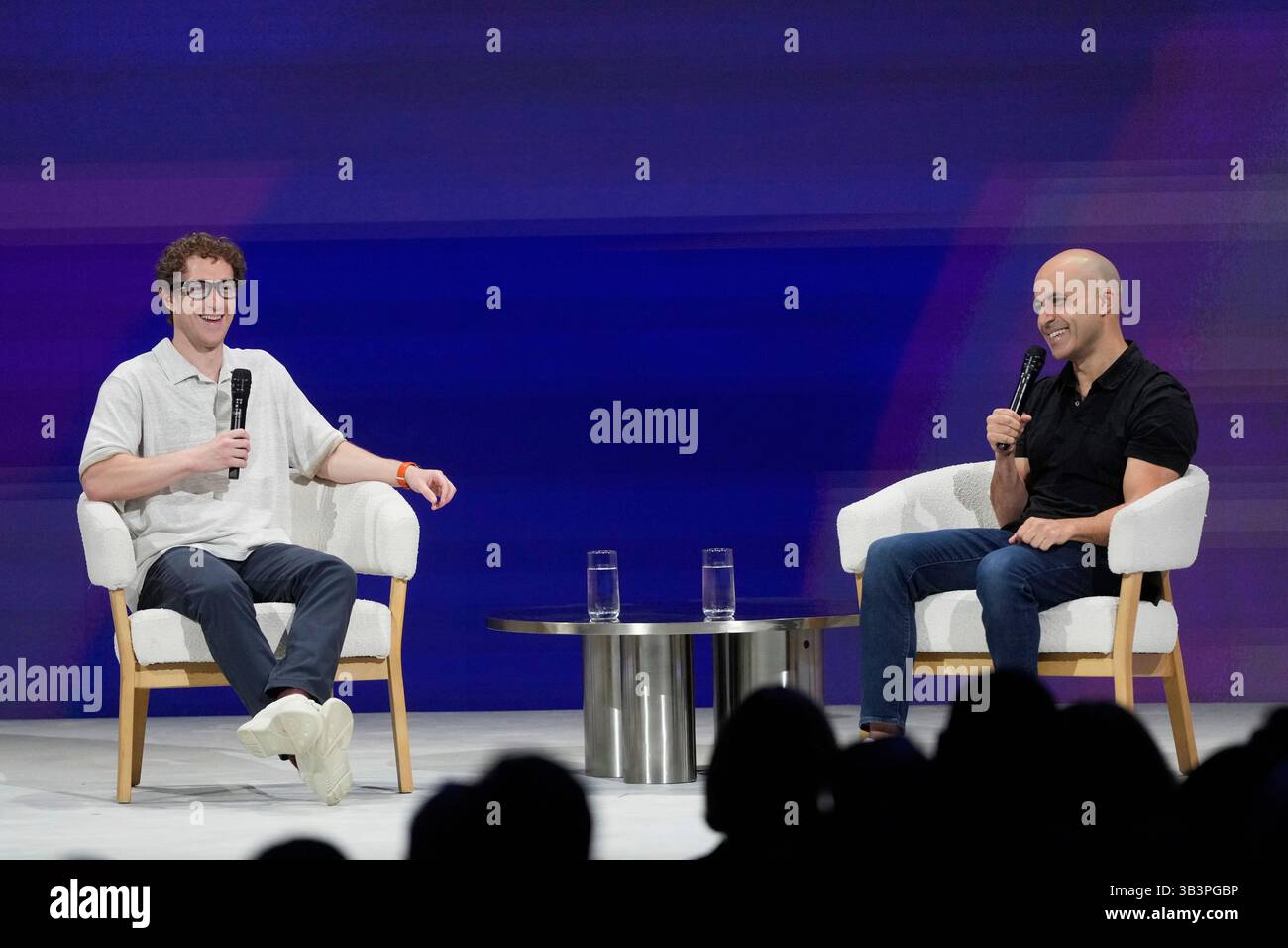 Meta Founder and CEO Mark Zuckerberg, left, speaks with Databricks Co ...