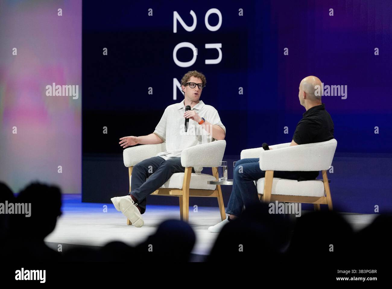Meta Founder and CEO Mark Zuckerberg, left, speaks with Databricks Co ...