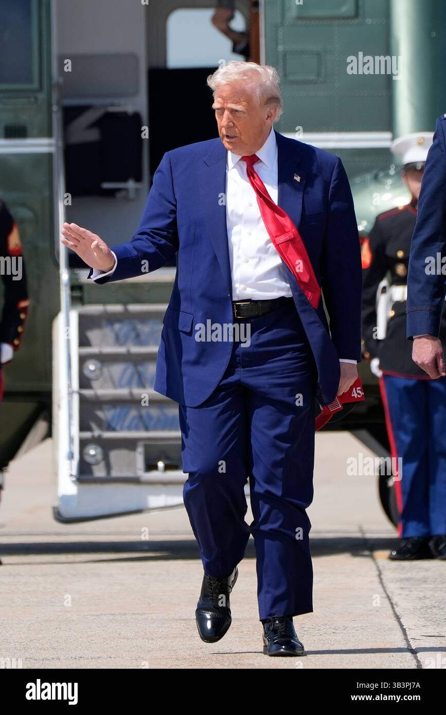 President Donald Trump walking across the tarmac before boarding Air ...